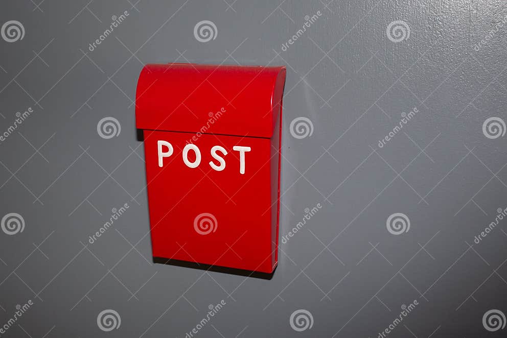 British Red Post Box on Grey Wall Background Stock Photo - Image of ...
