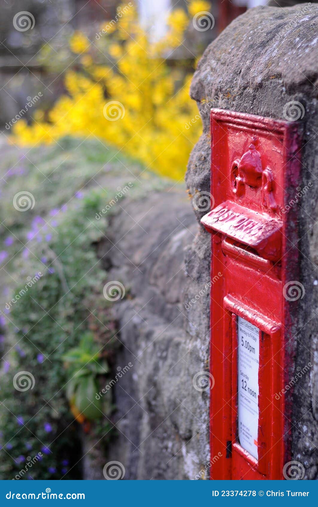 British Red Post Box in Wall Stock Photo - Image of flowers, mail: 23374278