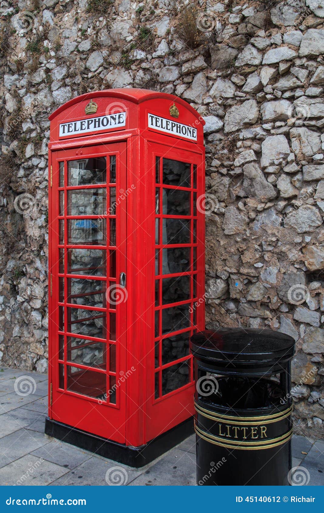 British Telephone Box and Litter Bin Stock Photo - Image of classic ...