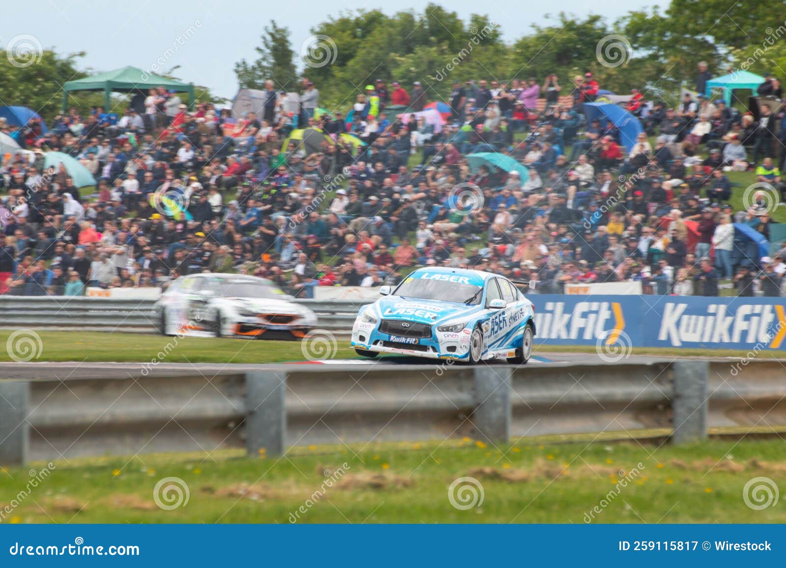 British Touring Car On The Track At Thruxton With Blurred Background