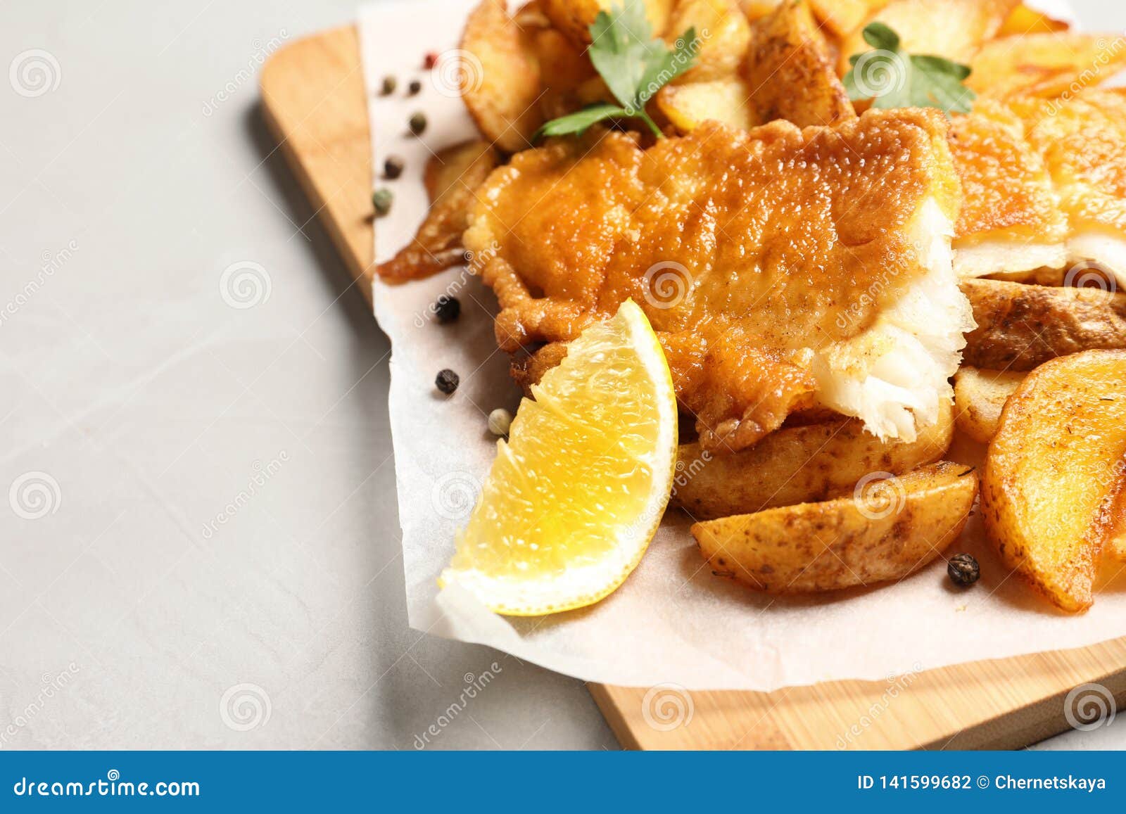 British Traditional Fish and Potato Chips on Table Stock Photo - Image ...