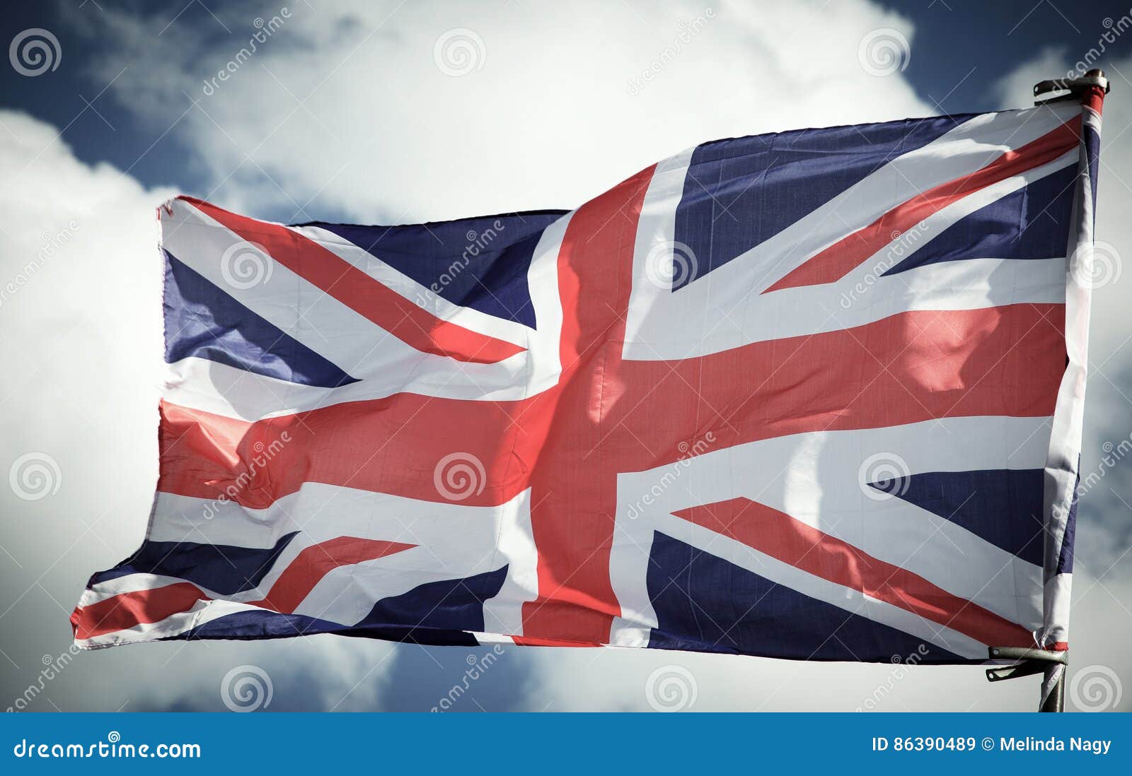 British Union Jack Flag Blowing in the Wind. Stock Image - Image of ...