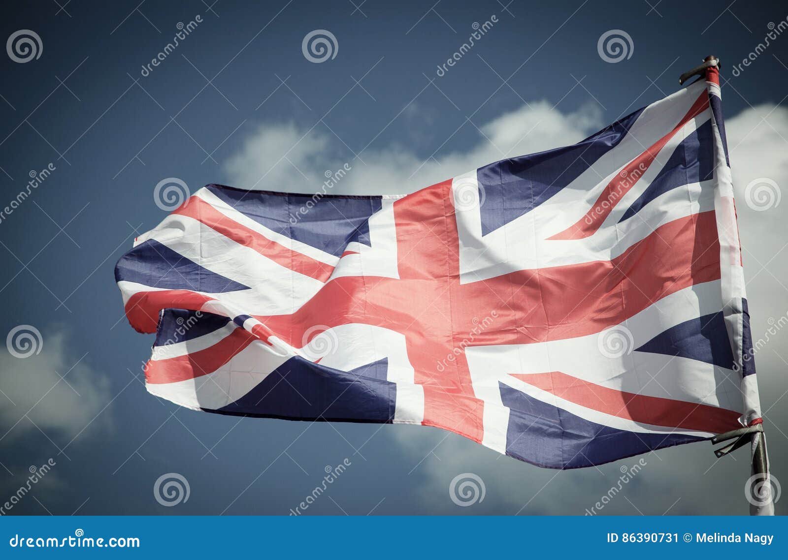 British Union Jack Flag Blowing in the Wind. Stock Image - Image of ...