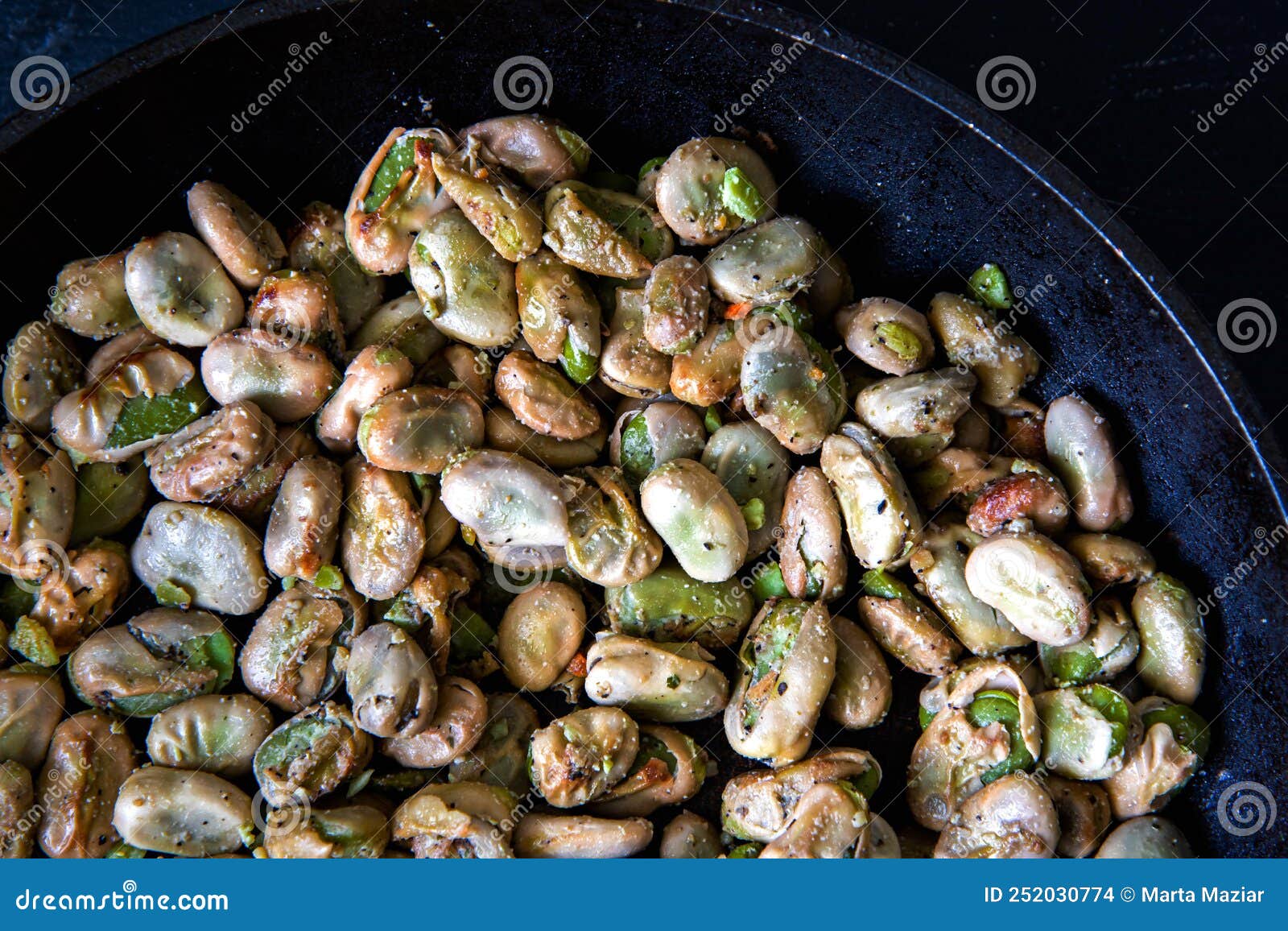 Broad Beans Stewed with Onion and Spices in a Pan Stock Photo - Image ...