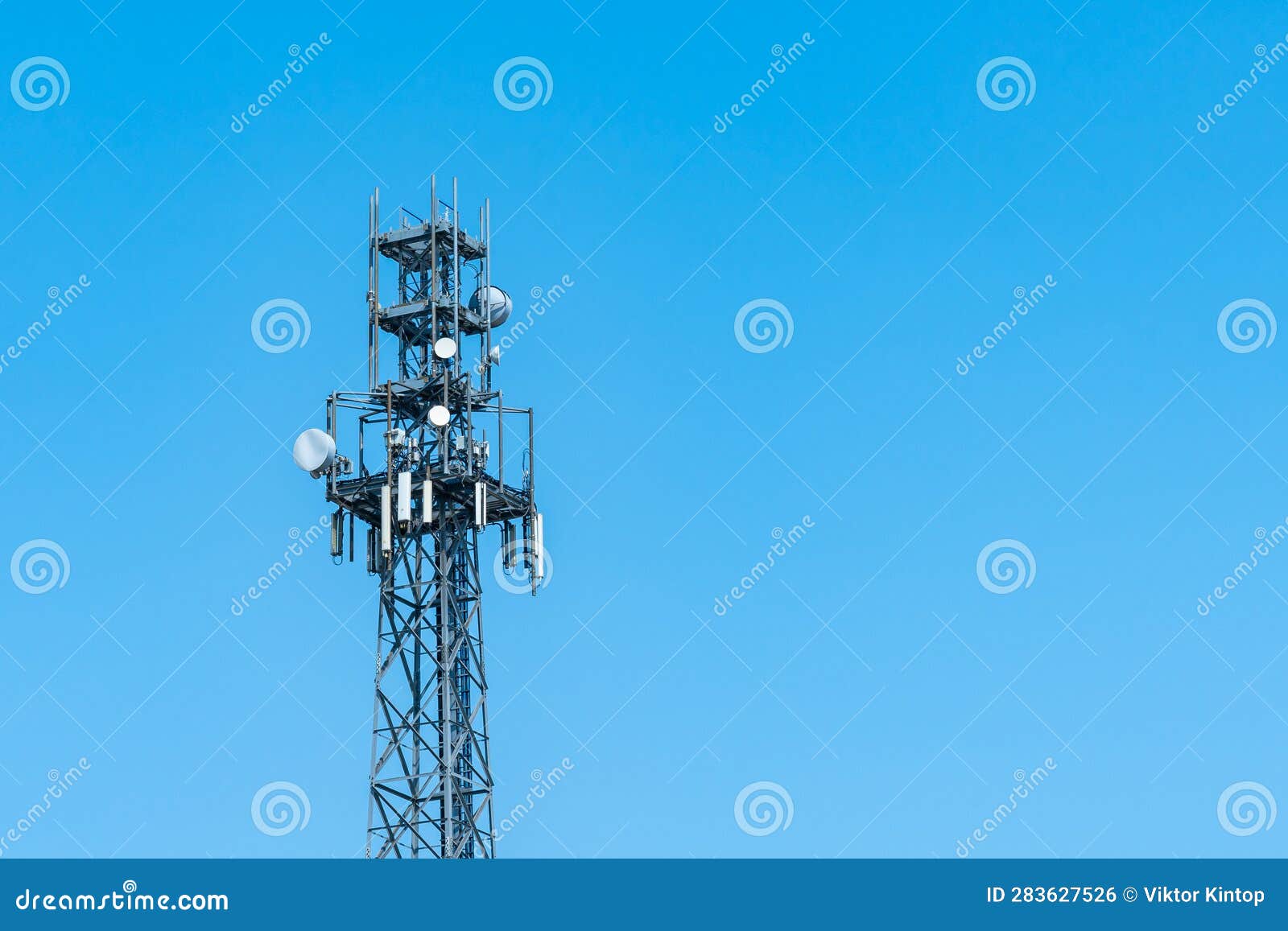 Broadcast Tower 5G with Satellite Dishes Against the Blue Sky. Stock ...