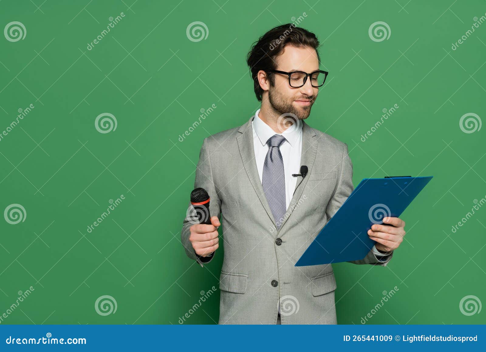 Broadcaster in Suit and Eyeglasses Holding Stock Image - Image of ...