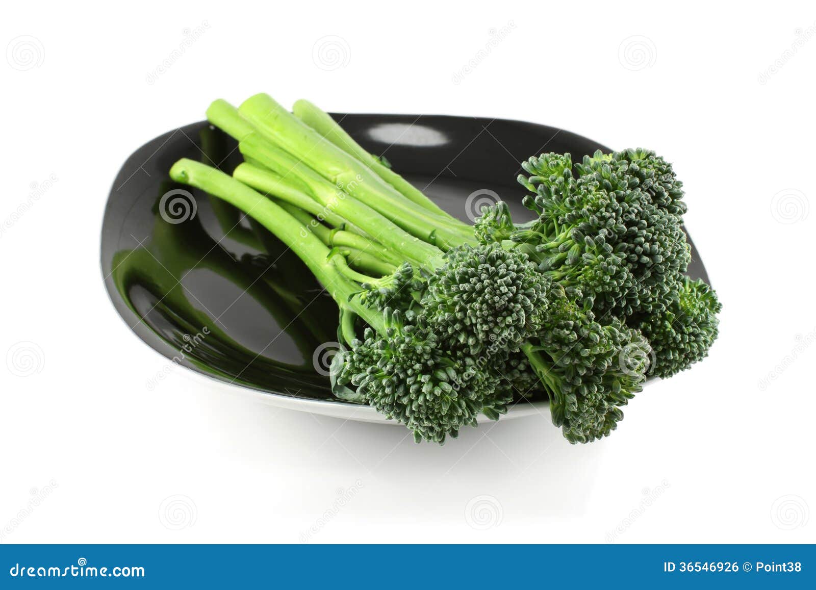 Broccoli on a Black Plate stock photo. Image of object - 36546926