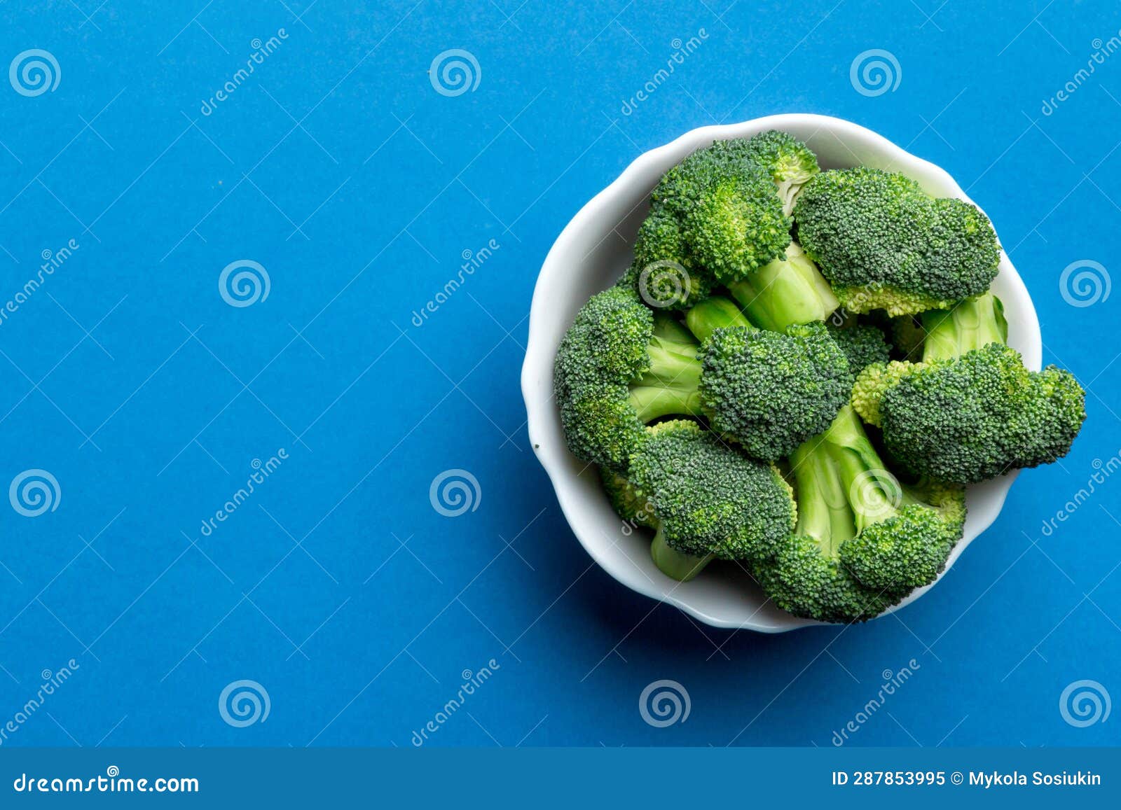 Broccoli of Fresh Green Broccoli in Bowl Over Coloredbackground ...