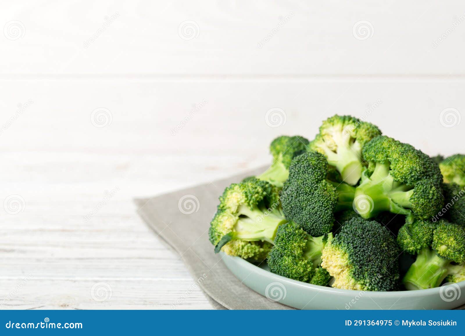 Broccoli of Fresh Green Broccoli in Bowl Over Coloredbackground ...