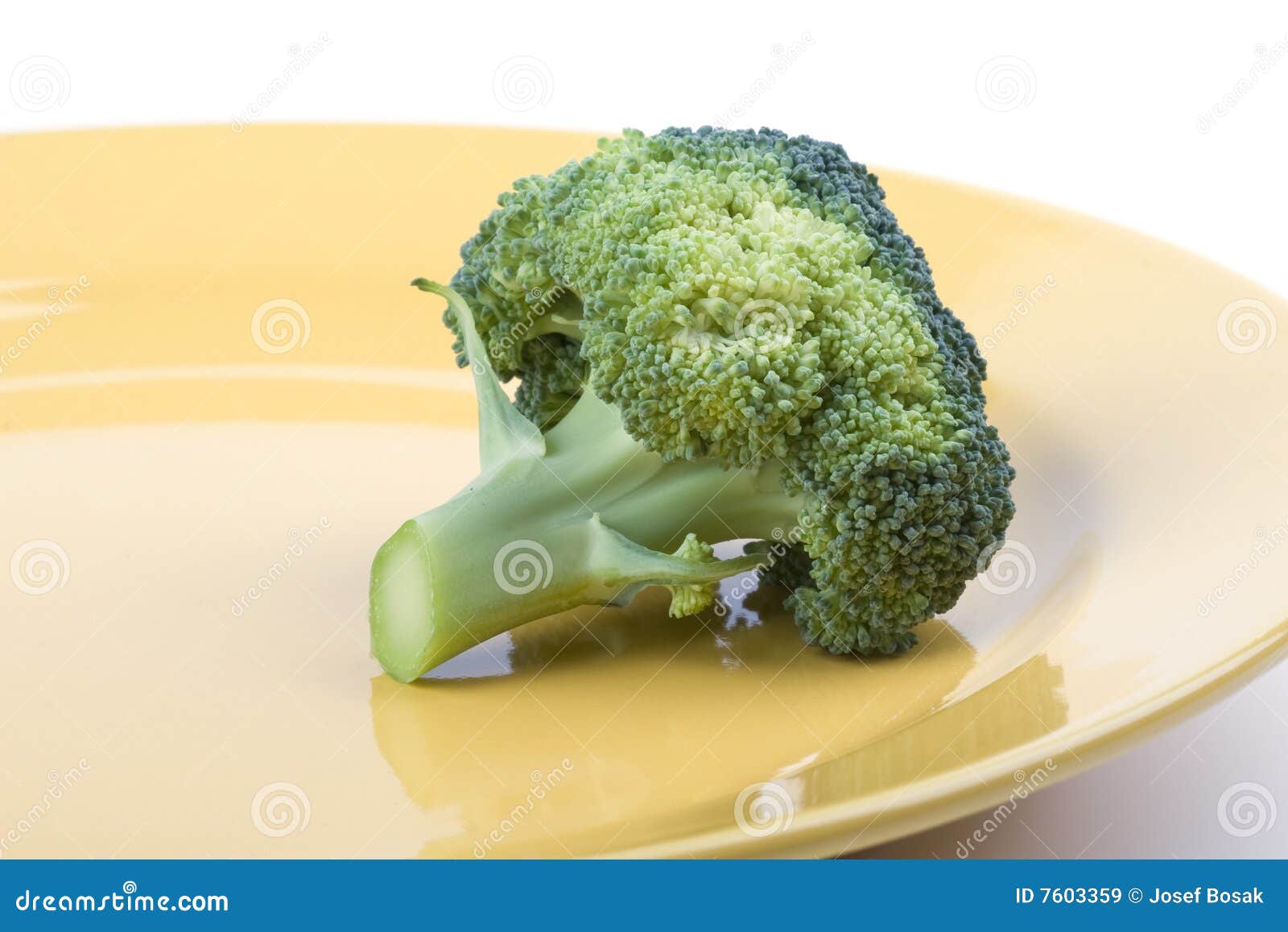 Broccoli on a plate stock image. Image of healthy, yellow - 7603359
