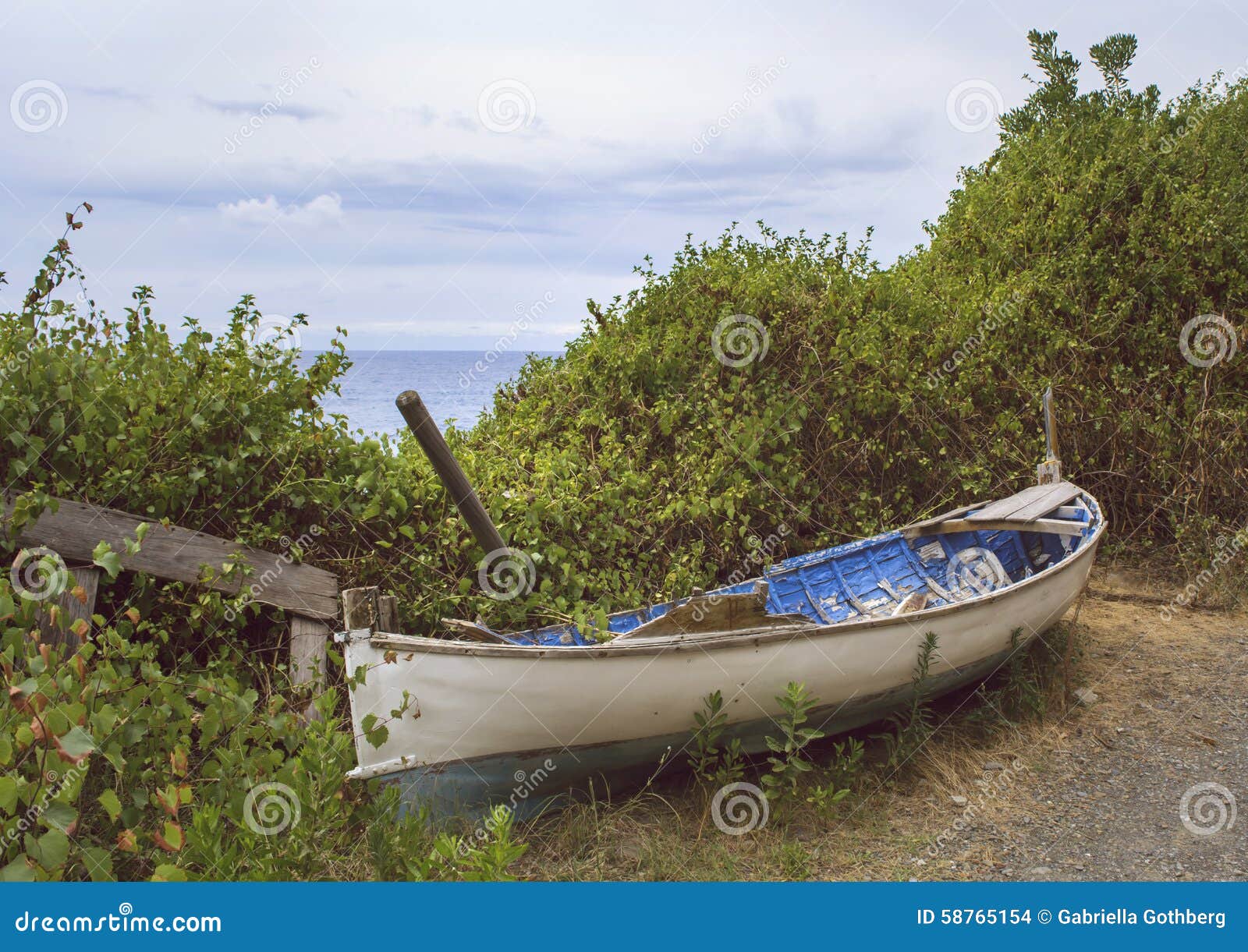 Broken and Abandoned Row-boat by the Ocean. Stock Photo - Image of ...