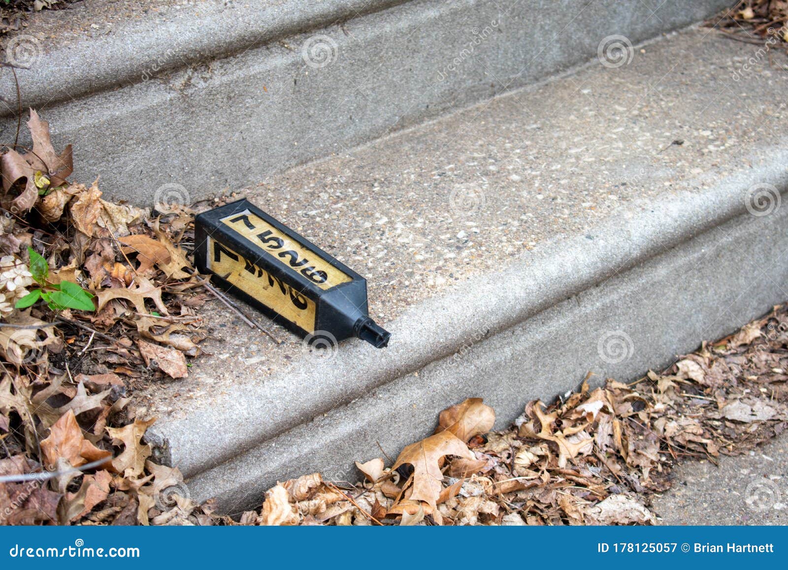 A Broken Address Sign on a Step Stock Image - Image of broken ...