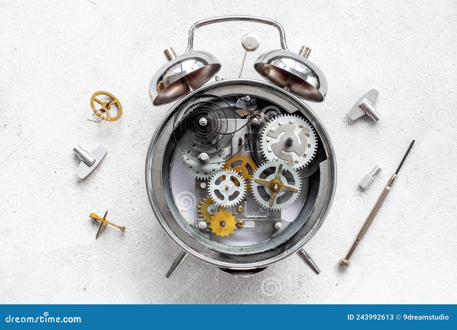 Broken Alarm Clock Top View. Watch Mechanism and Watchmaker Tools Stock ...