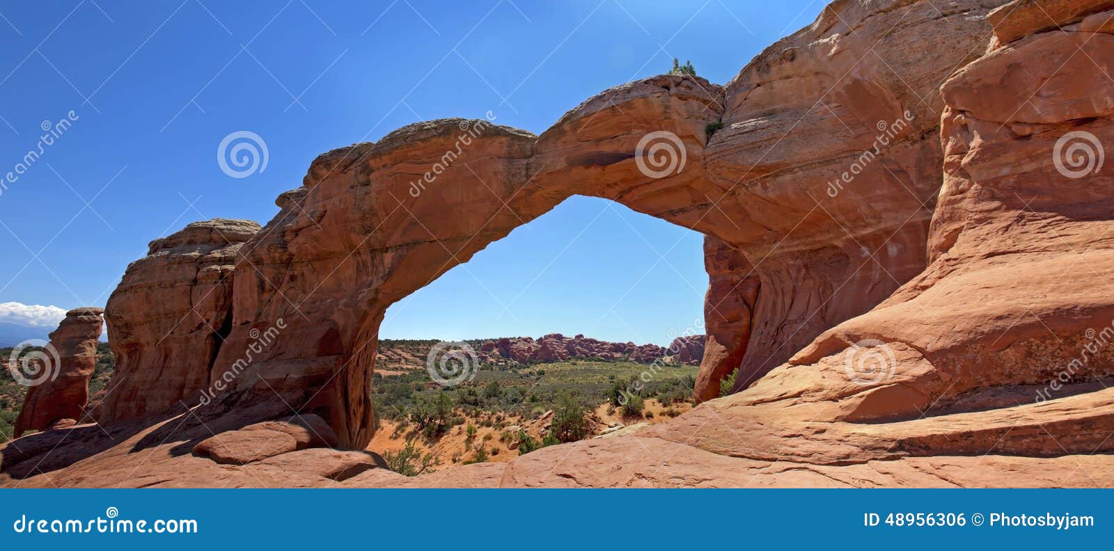 Broken Arch in Arches National Park Stock Photo - Image of hole, rocks ...