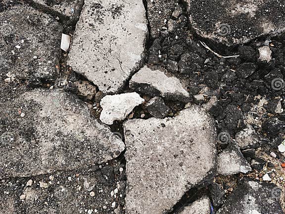 Broken asphalt pavement stock photo. Image of outdoor - 250850352