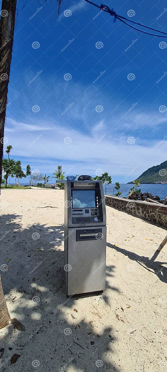 Broken ATM Machine on the Beach Stock Photo - Image of machine, sand ...