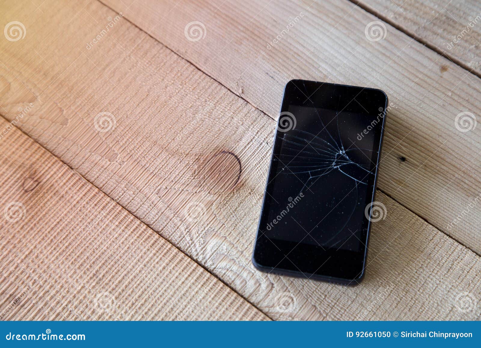 Broken Black Mobile Phone on Wooden Background Stock Photo - Image of ...