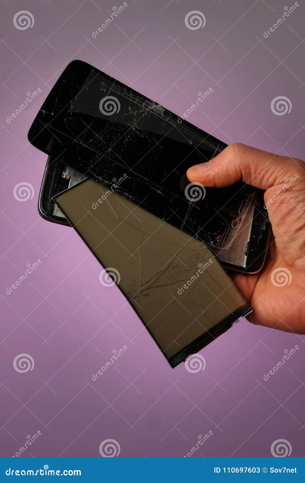 Broken Black Mobile Smartphone with a Cracked Display Lying in His Hand ...