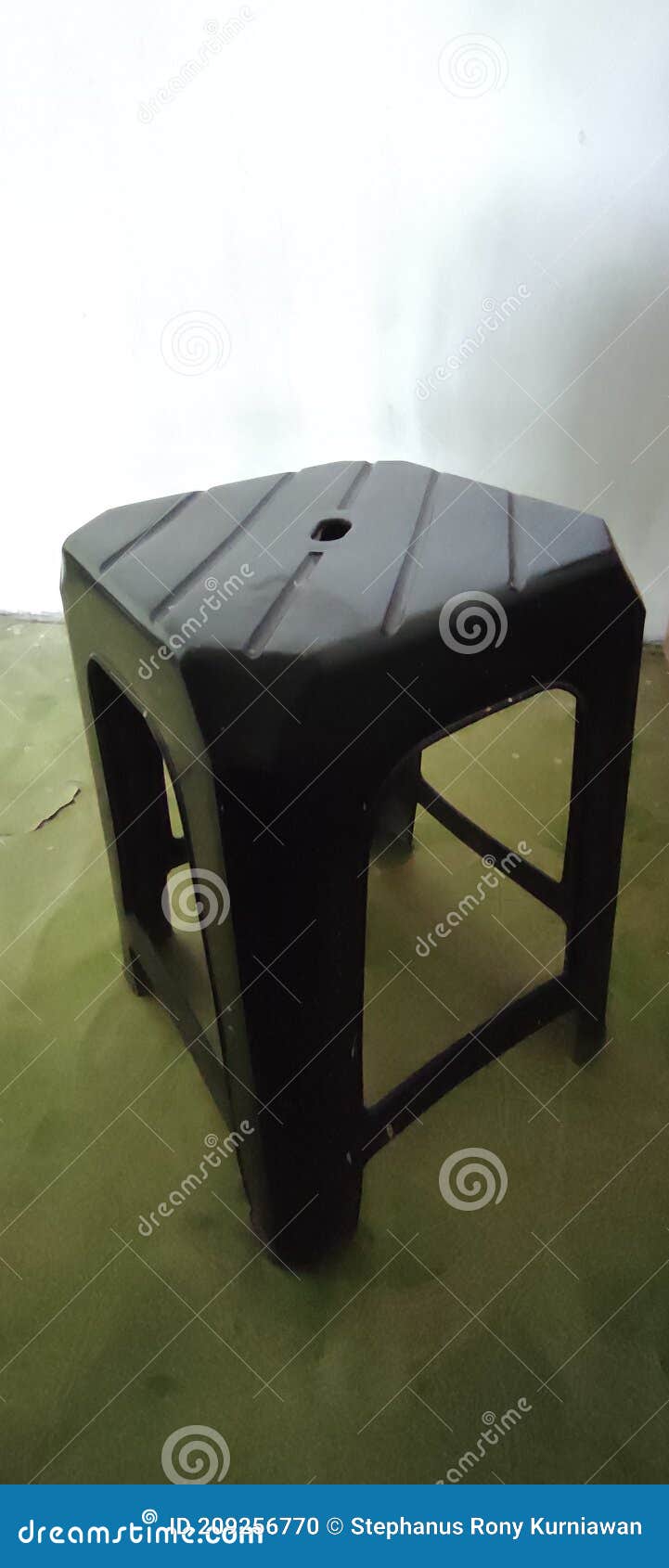 Broken black plastic chair stock photo. Image of seat - 209256770