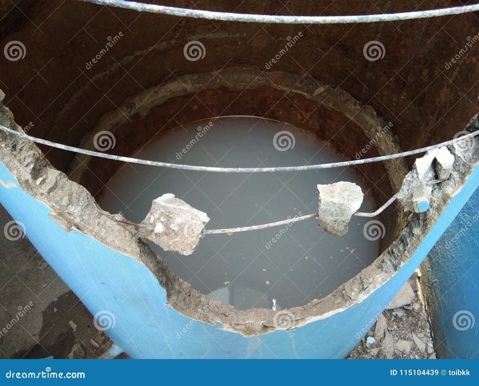 Broken blue cement tank stock image. Image of conctructure - 115104439