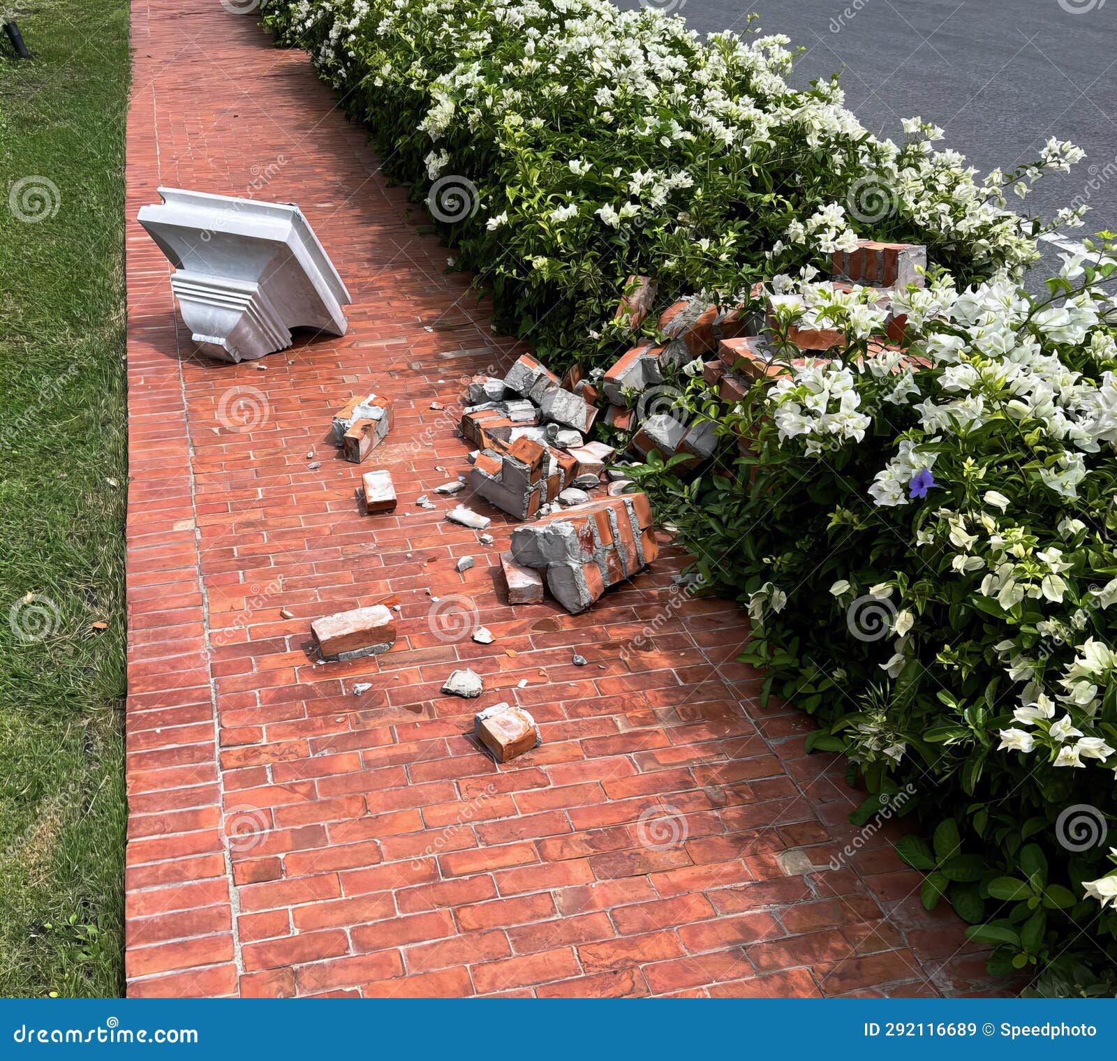 A Broken Brick Wall and a Broken Sink on a Side Walk Stock Image ...