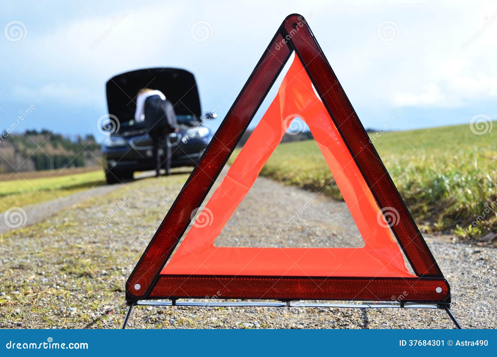 Broken car and triangle stock image. Image of breakdown - 37684301