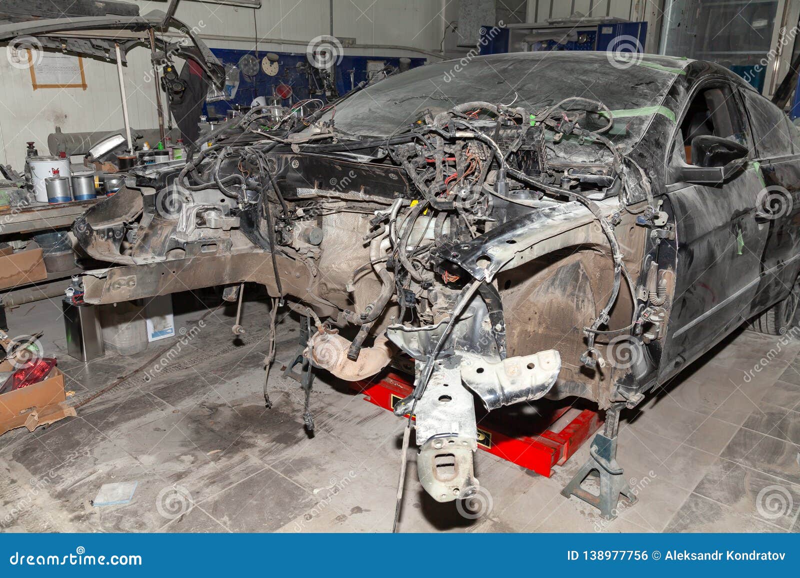 A Broken Car with a Violation of Geometry is on the Stocks for Leveling ...