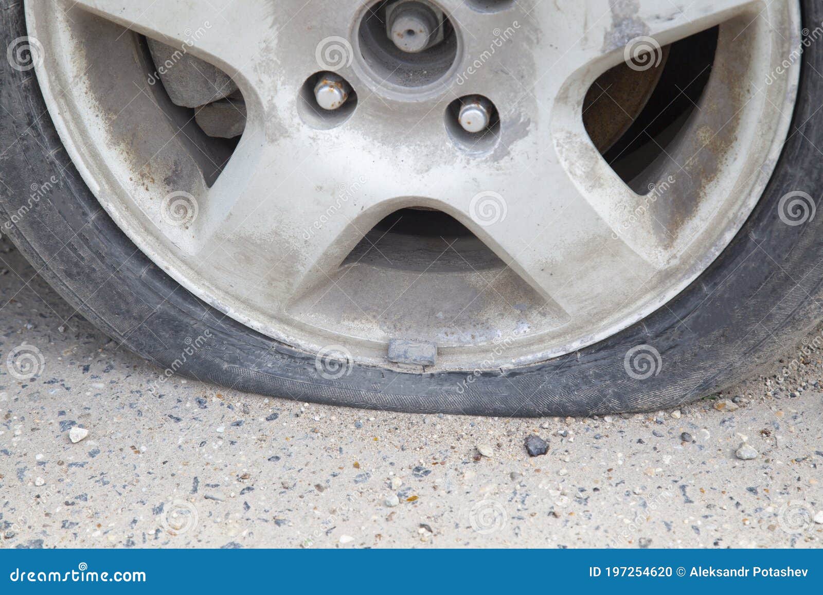 A Broken Car Wheel. a Car Requiring Tire Repair Stock Photo - Image of ...