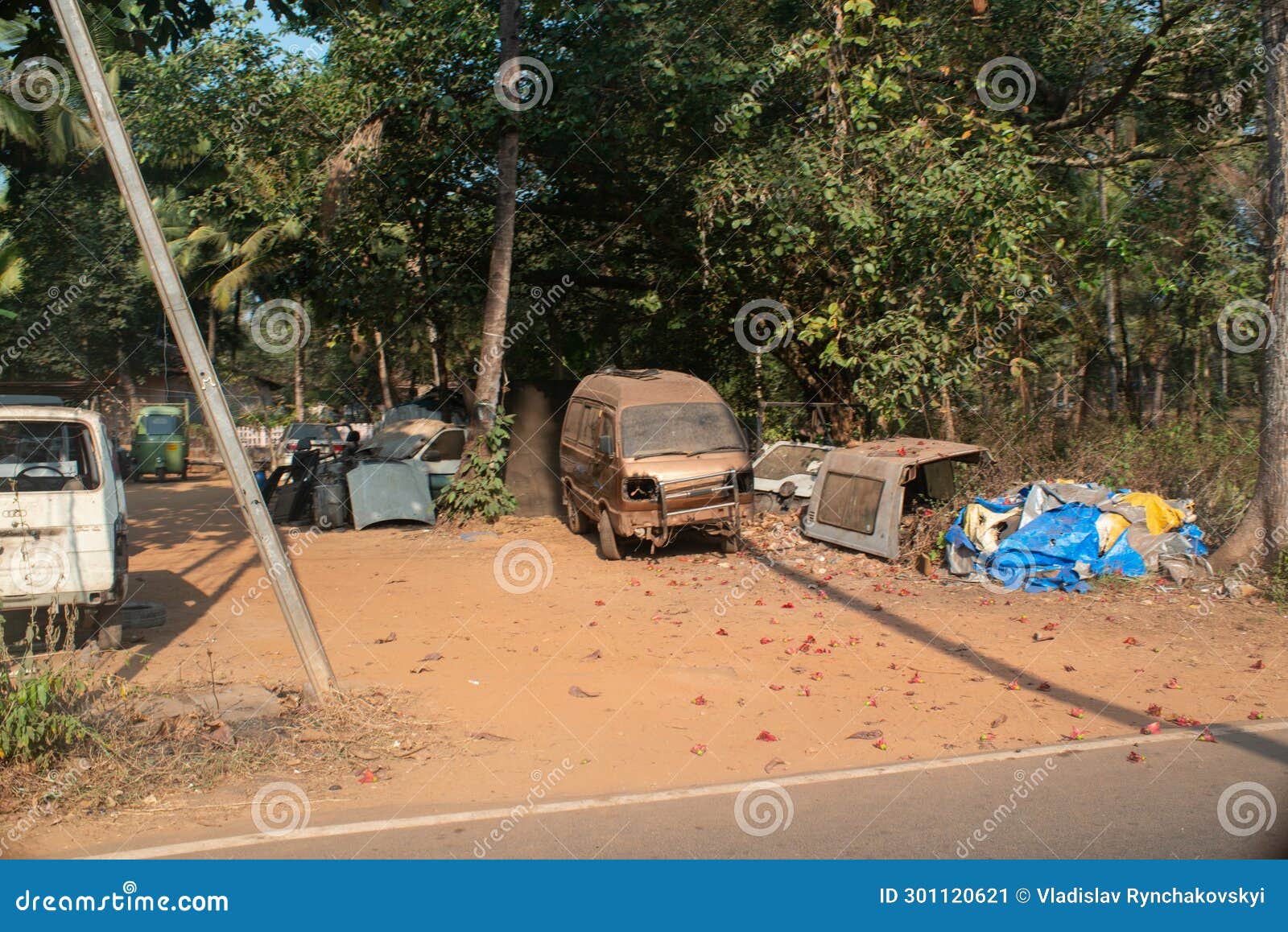 Broken Cars and Piles of Garbage Along the Road Stock Image - Image of ...