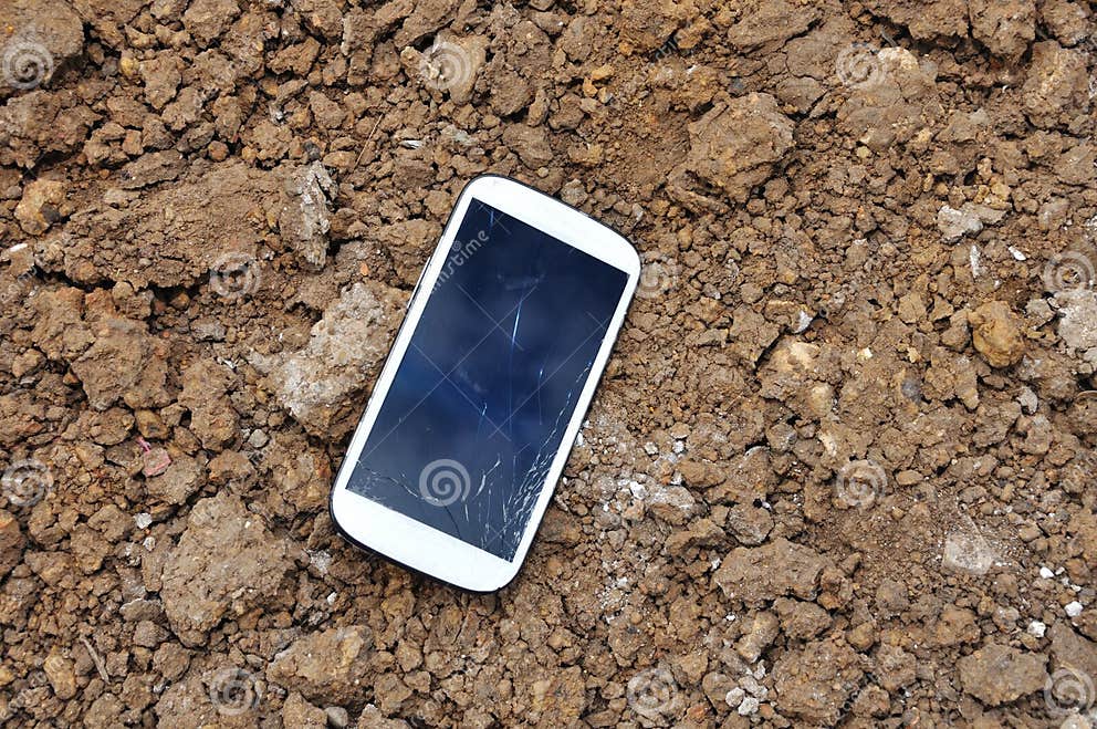 Broken Cell Phone on Soil Surface. Stock Image - Image of traffic ...