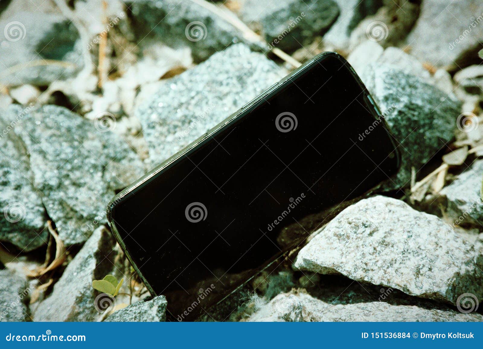 Broken Cellphone Abandoned and Lost among the Gravel Stock Photo ...