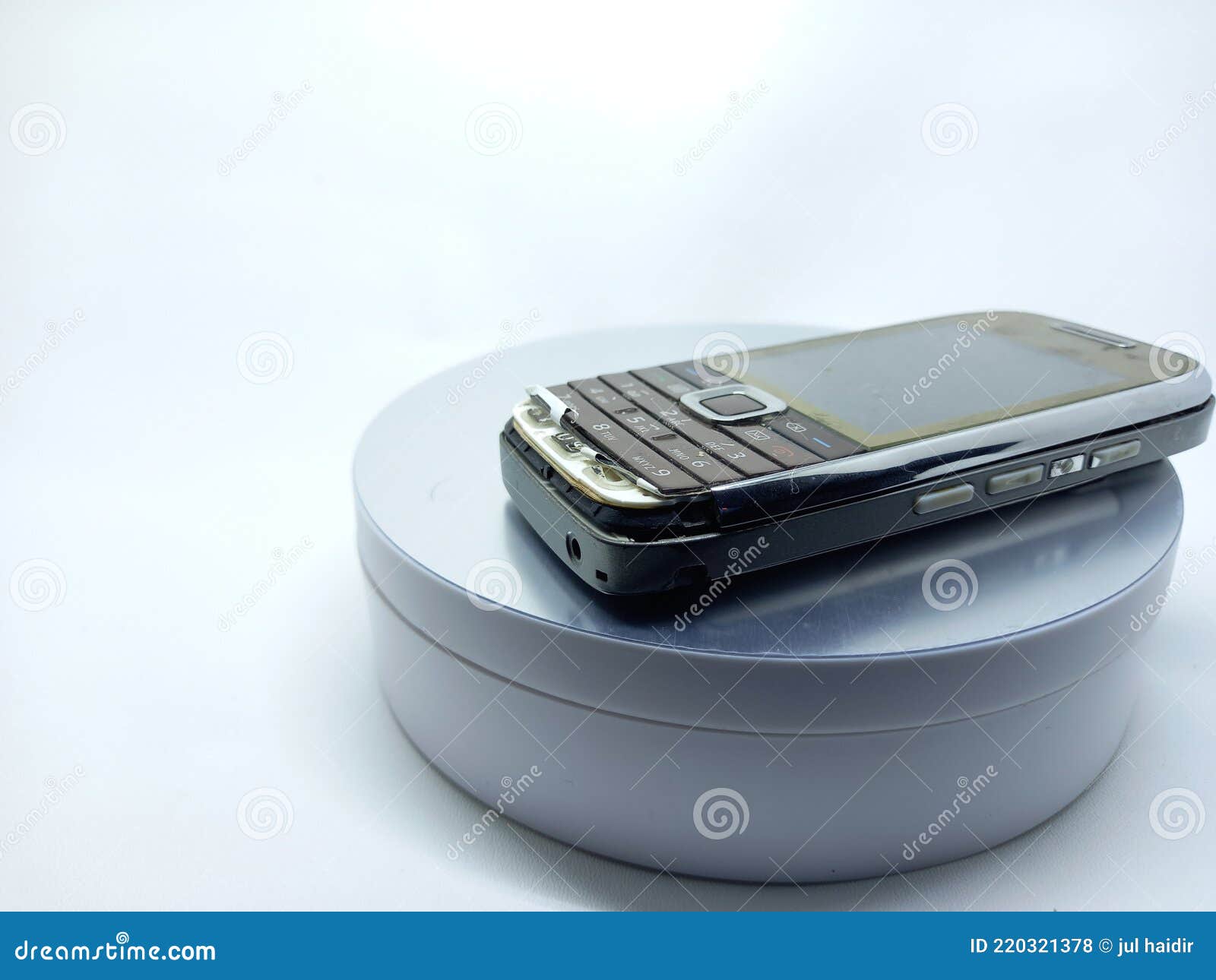 Broken Cellphone Keypad on Old Cellphone on White Background on ...