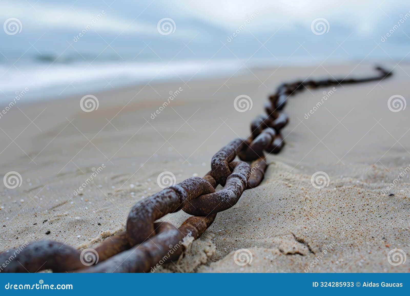 Broken Chain Link Lying on Sandy Beach Symbolizes Freedom and ...