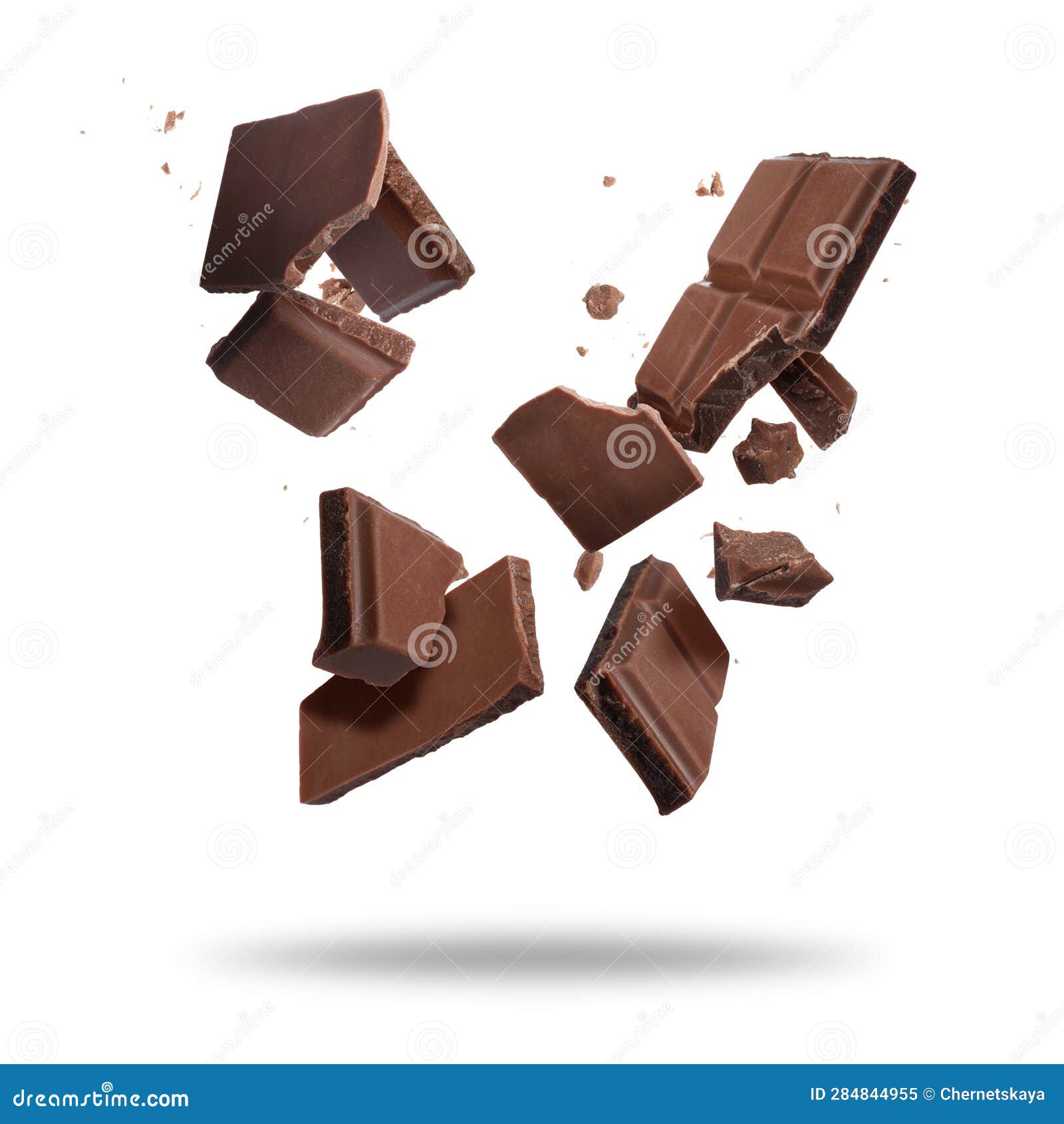 Broken Chocolate Bar Pieces Falling on White Background Stock Image ...