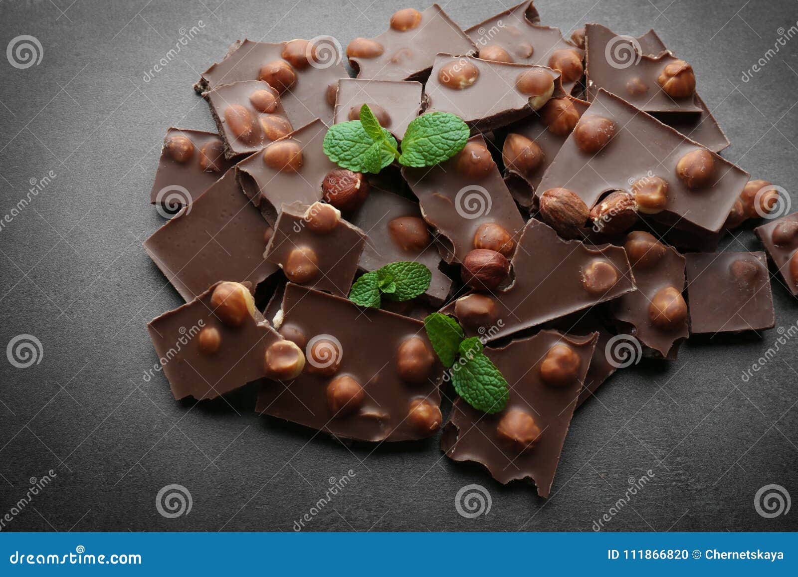 Broken Chocolate Pieces with Hazelnut Stock Photo - Image of ...
