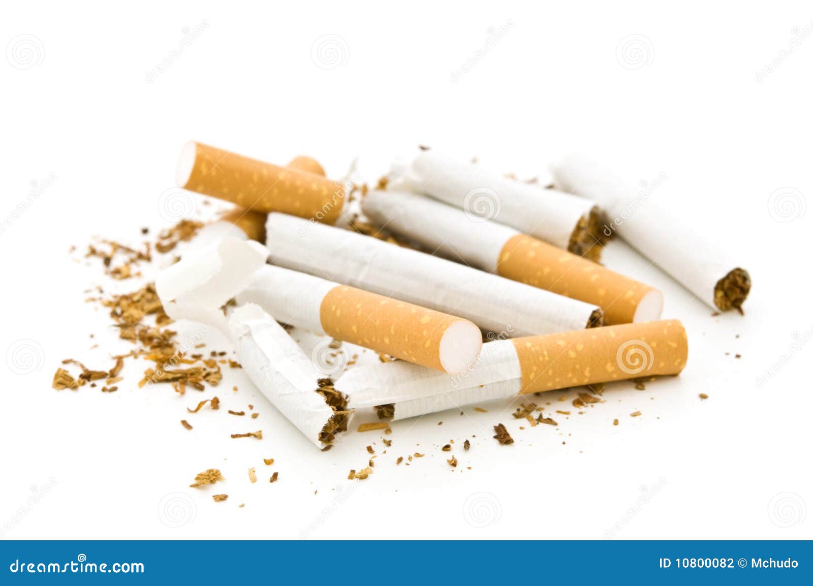 Broken Cigarettes And A Crumpled Pack Lie On A Wooden Surface ...