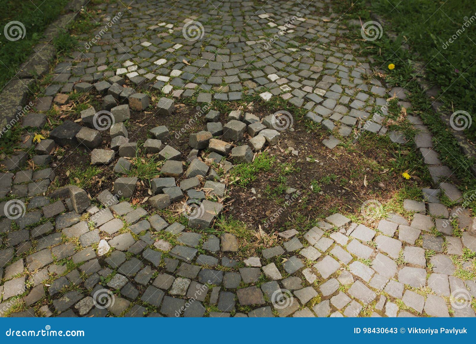 Broken Cobbles with Grass in the City Park Stock Image - Image of block ...