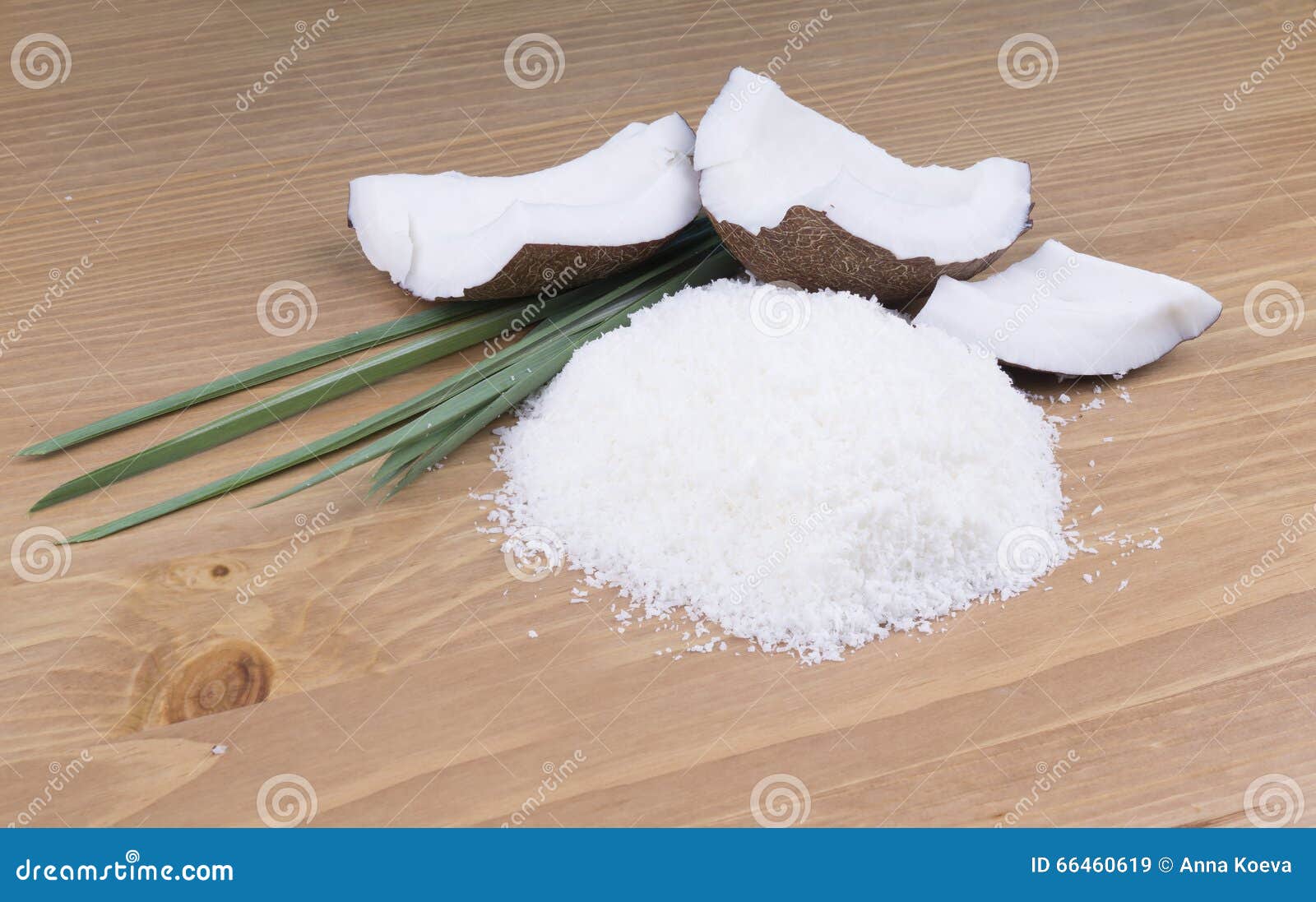 Broken Coconut Lies on a Wooden Surface. Coconut is Scattered Stock ...
