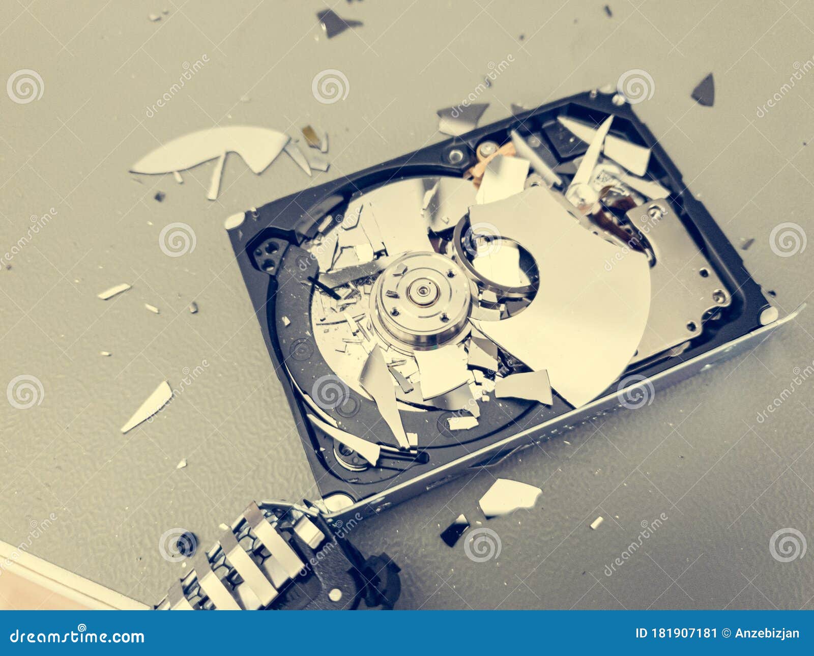 Broken Computer Hard Disk on a Table - Complete Data Destruction. Stock ...