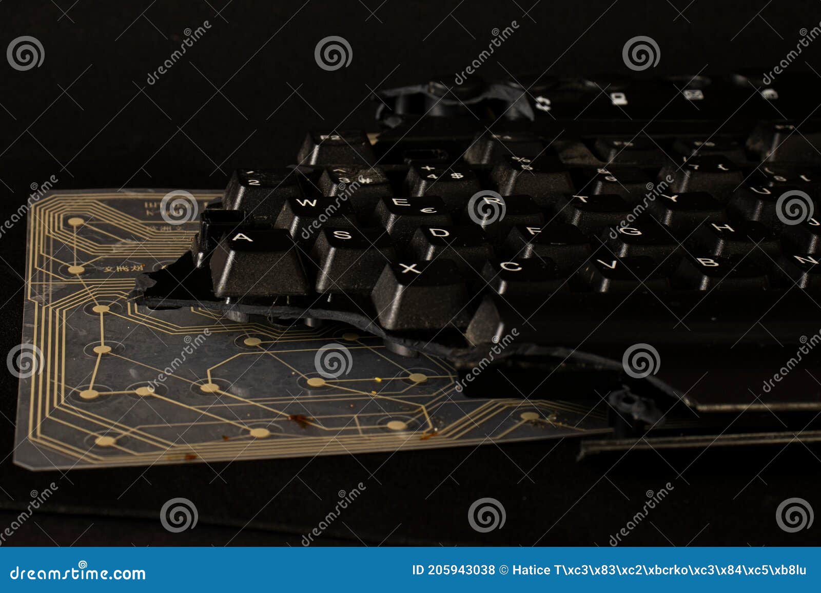 A Broken Computer Keyboard Isolated on Black Stock Photo - Image of ...