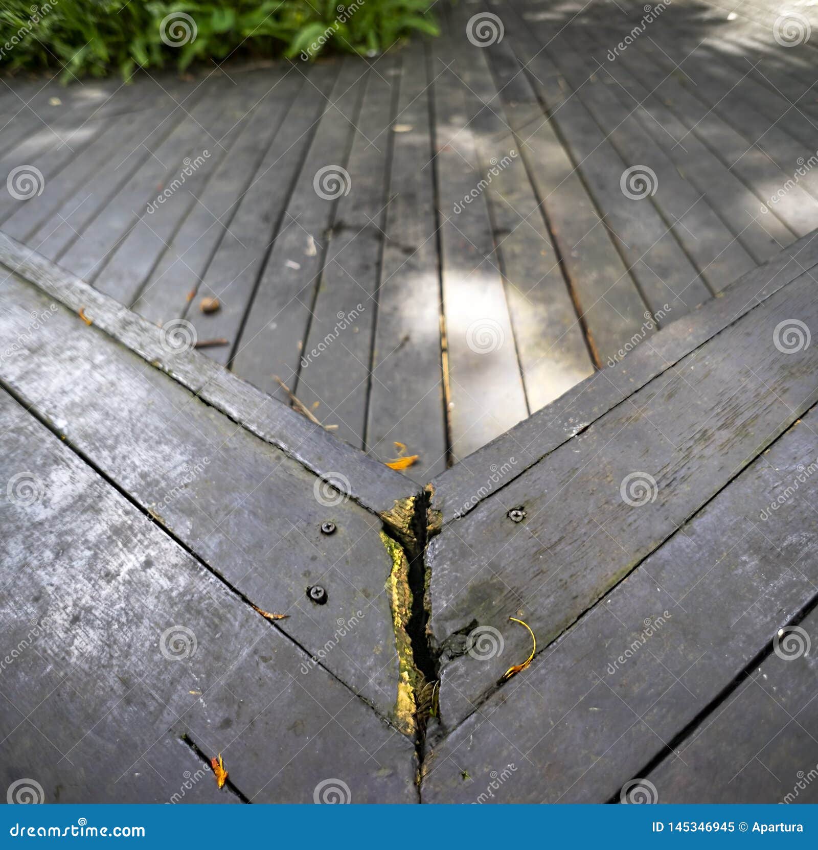 Broken Corner of Moldy Wood Bench or Chair in the Public Park Stock ...