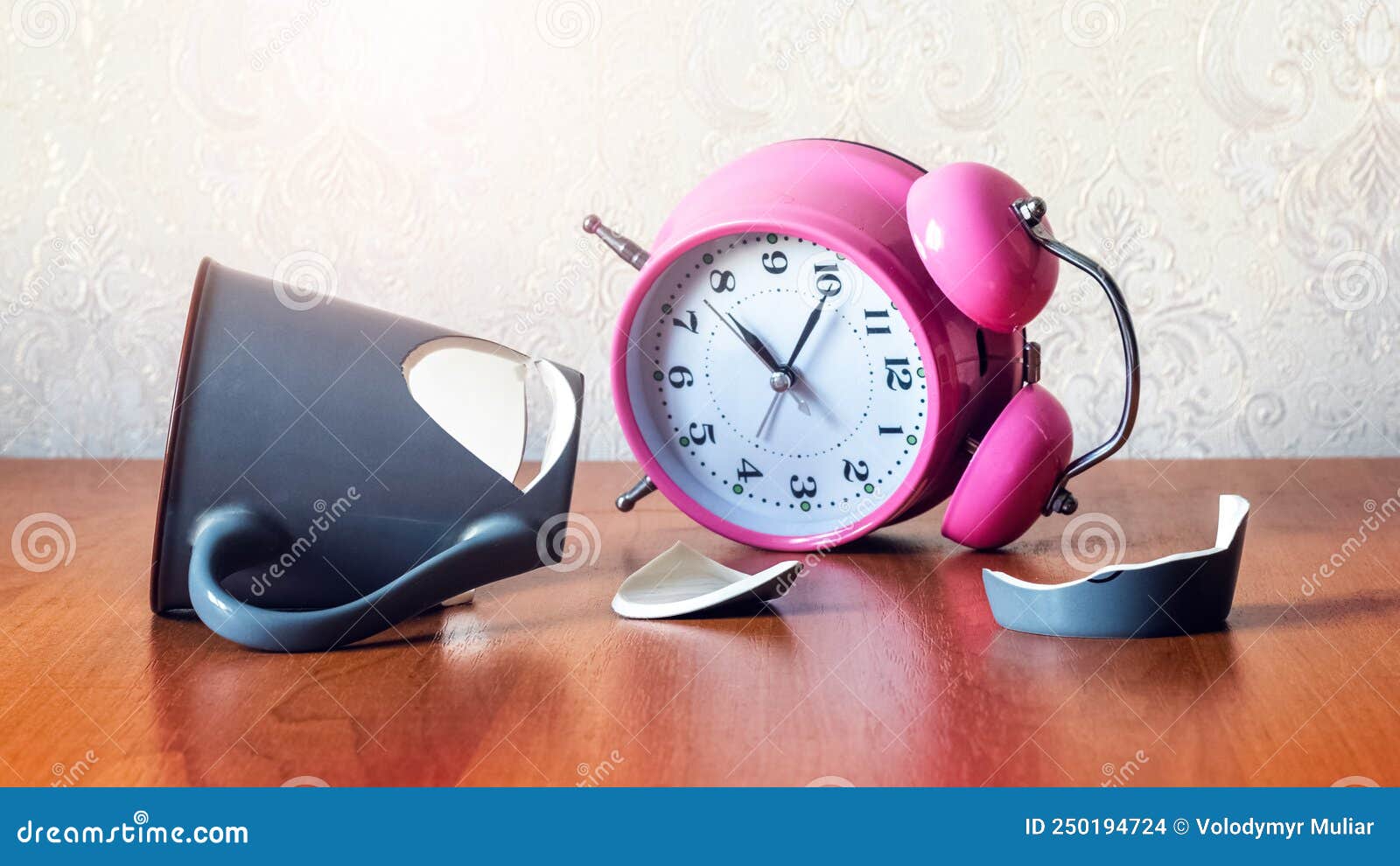 Broken Cup and Overturned Clock on the Desk in the Office Stock Photo ...