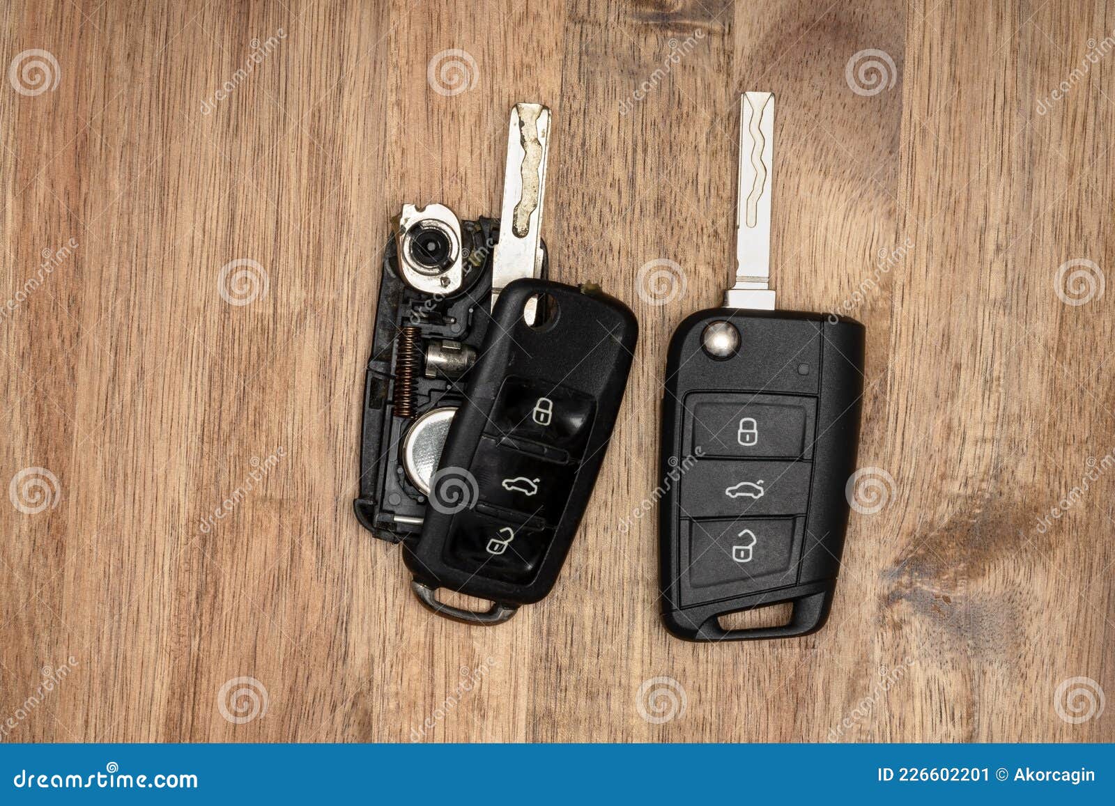 Broken or Damaged Car Key Fob on Wooden Background. Repair of Broken or ... Broken or Damaged Car Key Fob on Wooden Background. Repair of Broken or ...