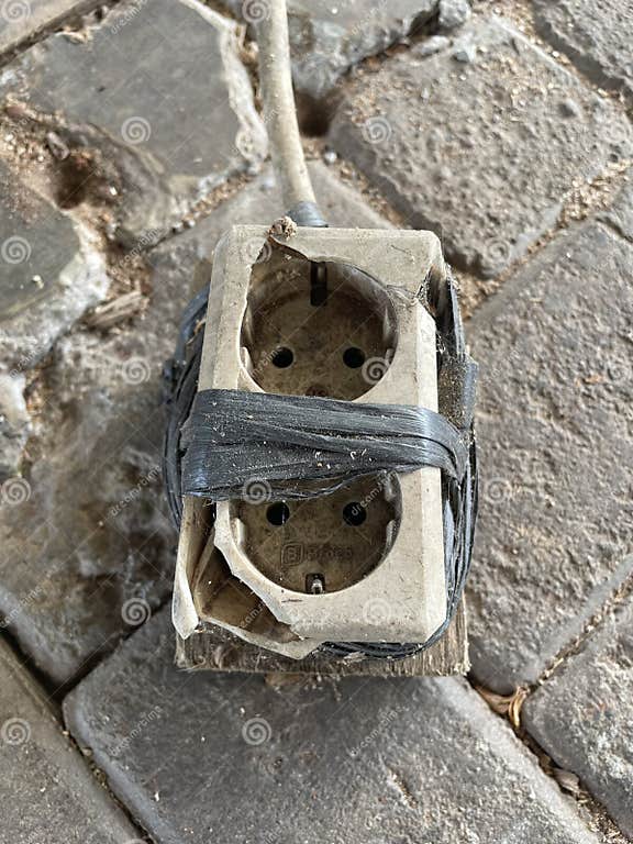 A Broken and Dangerous Socket. Stock Photo - Image of blue, electrician ...