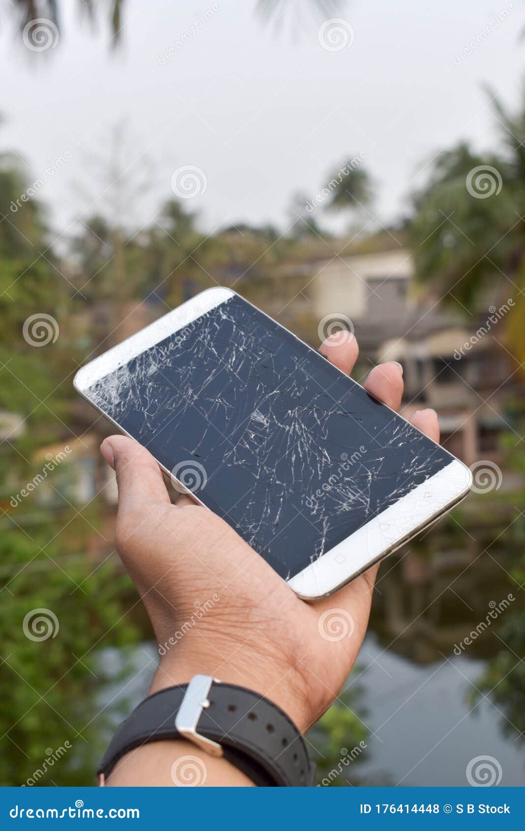 Broken Device Screen of a Mobile Phone. Cracked Touch Screen of Digital ...