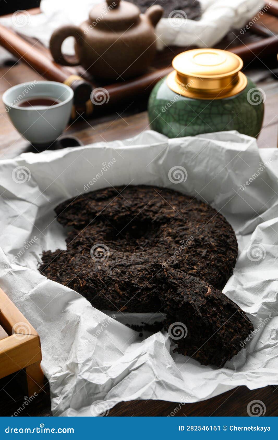 Broken Disc Shaped Pu-erh Tea on Table Stock Image - Image of fermented ...