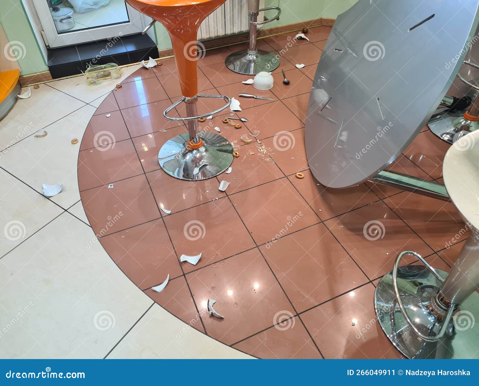 Broken Dishes and Table on Floor in Kitchen Stock Image - Image of ...