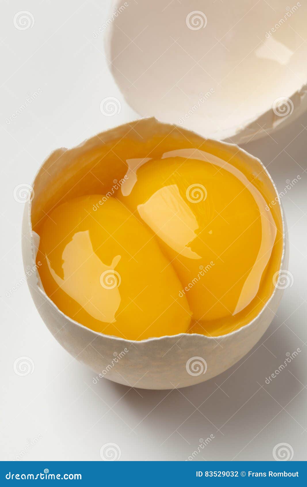 Broken Double Yolk Egg Stock Photography | CartoonDealer.com #83529032