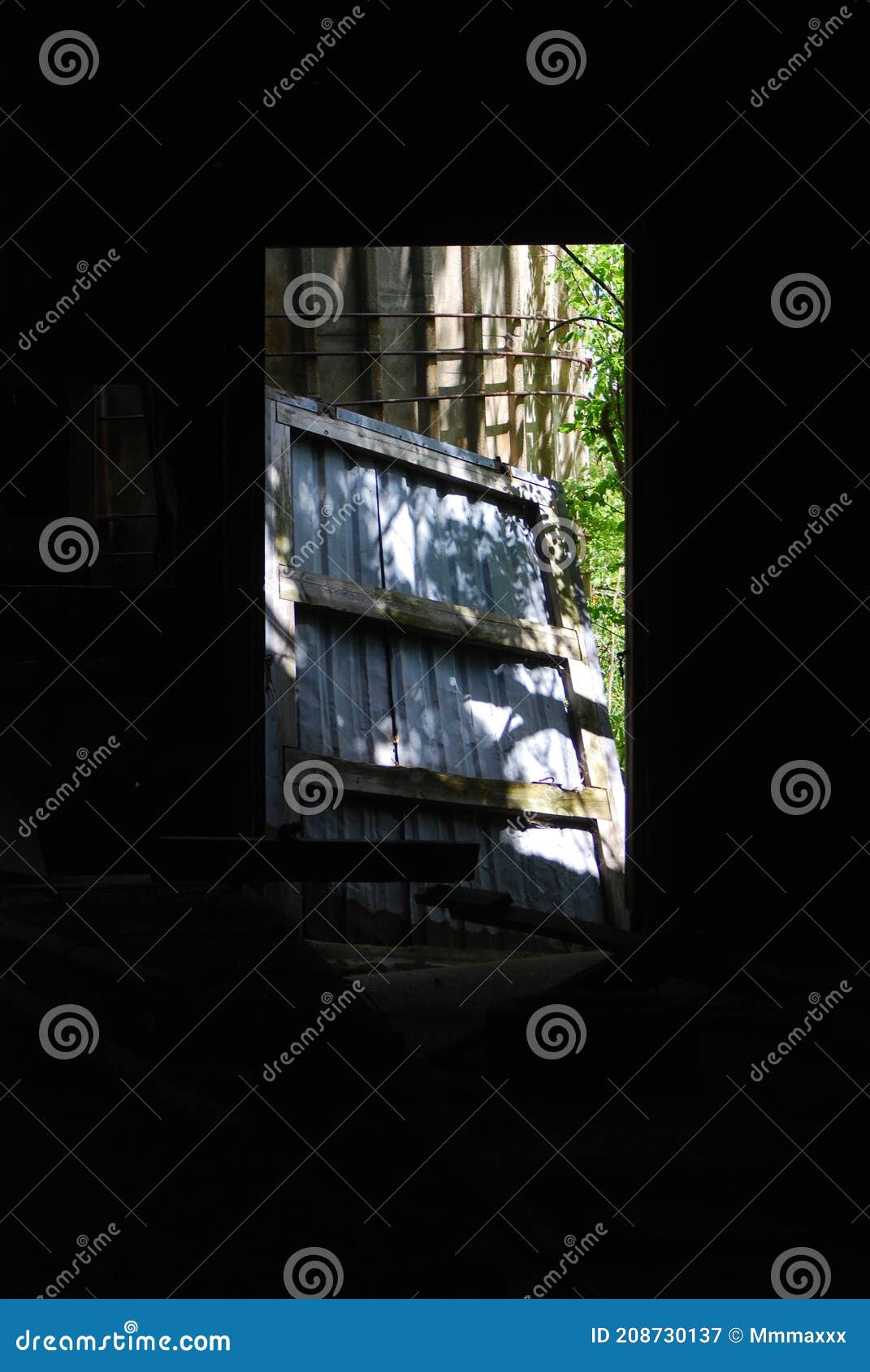 Broken Down Old Barn Door Falling Off Hinges Silouetted by Doorway ...