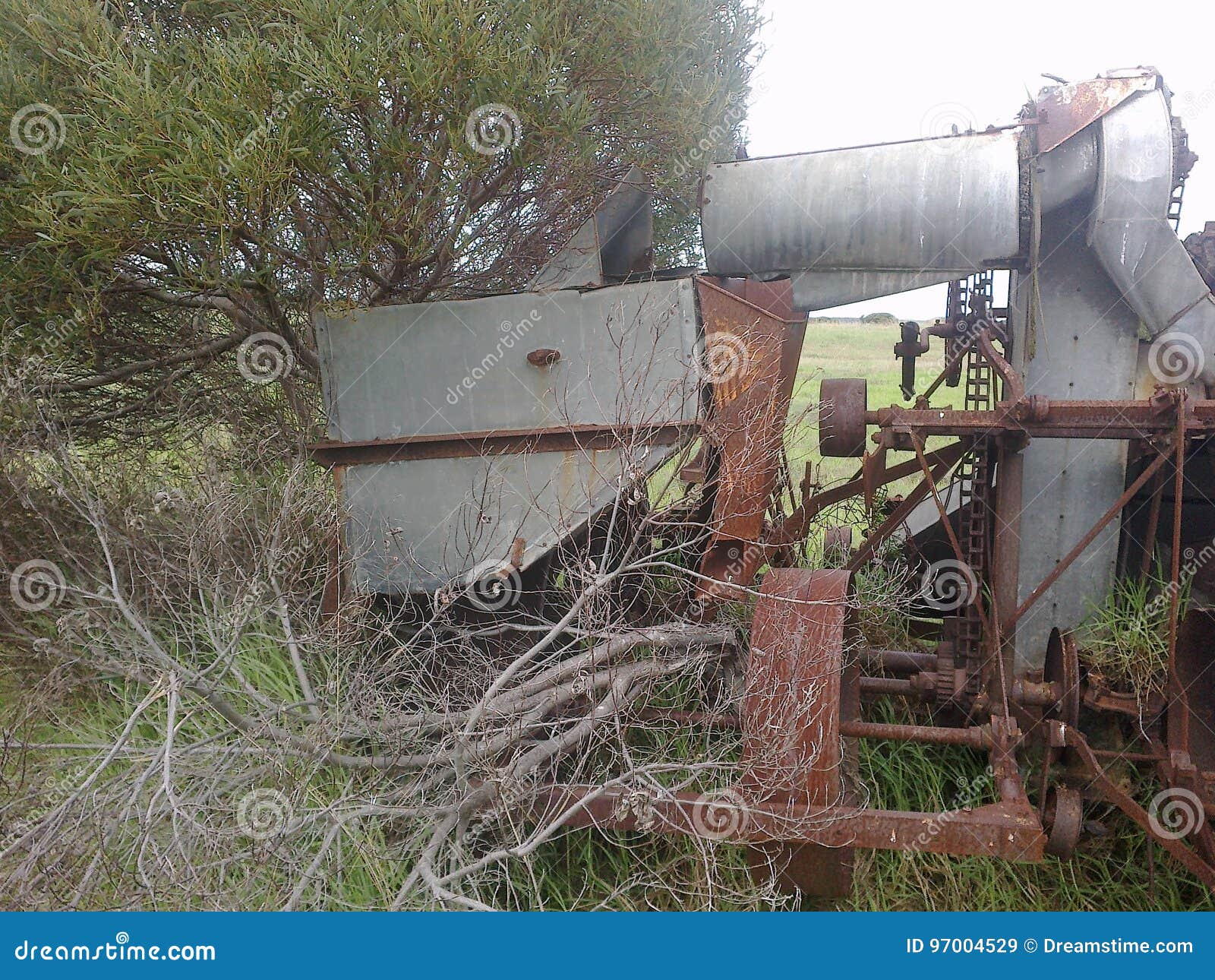 Broken down farm machinery stock image. Image of looking - 97004529